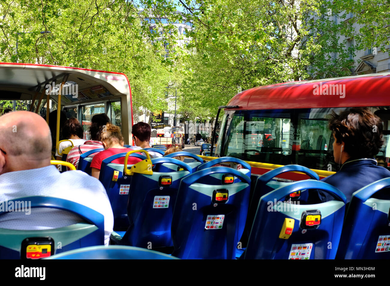 Open top sightseeing bus on Aldwych - London Stock Photo - Alamy