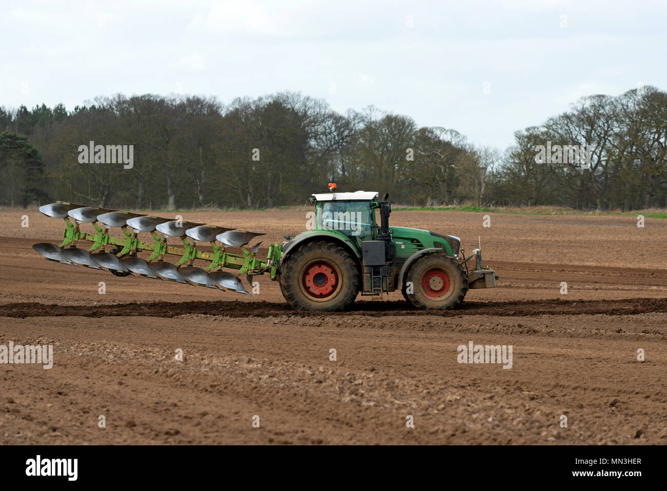 Tractor and plough Shottisham Suffolk UK Stock Photo - Alamy