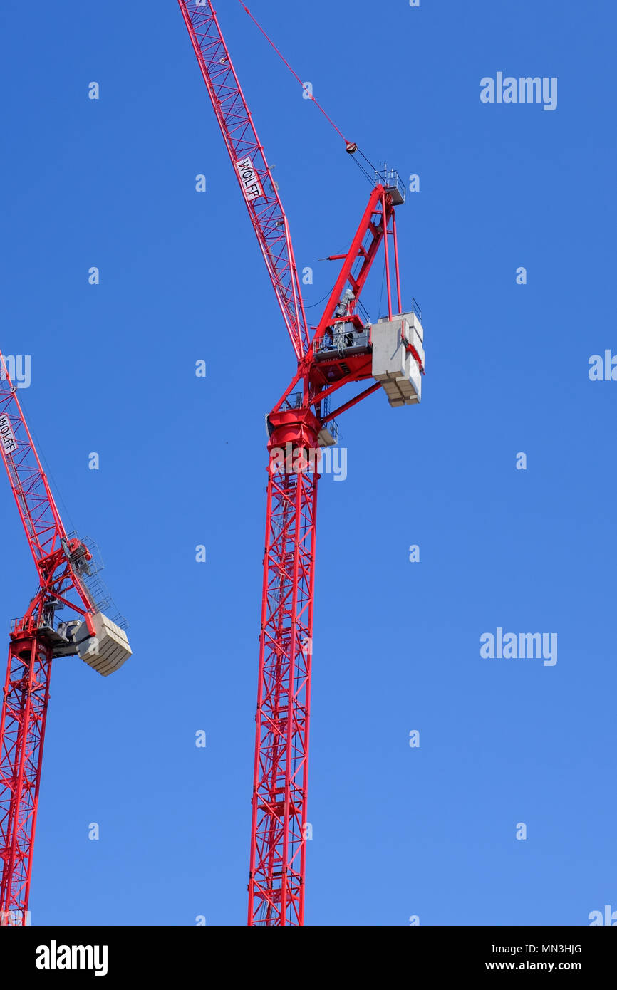 Red construction cranes above Victoria Embankment London Stock Photo ...