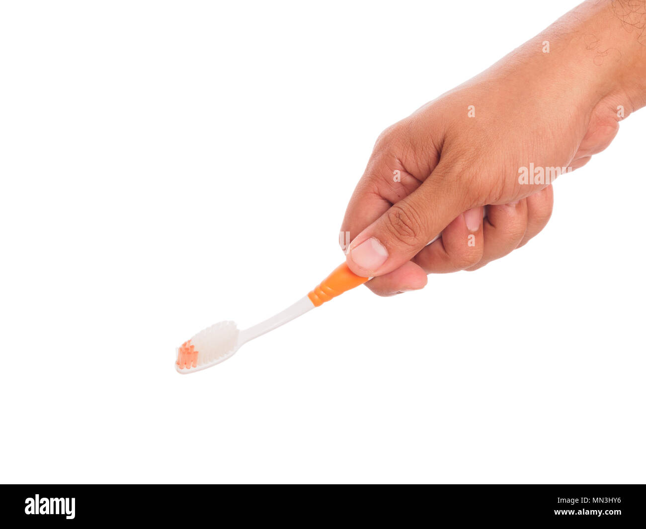 hand holding toothbrush isolated on white Stock Photo - Alamy