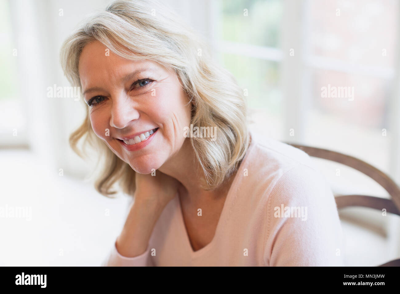 Portrait confident, smiling mature woman Stock Photo - Alamy