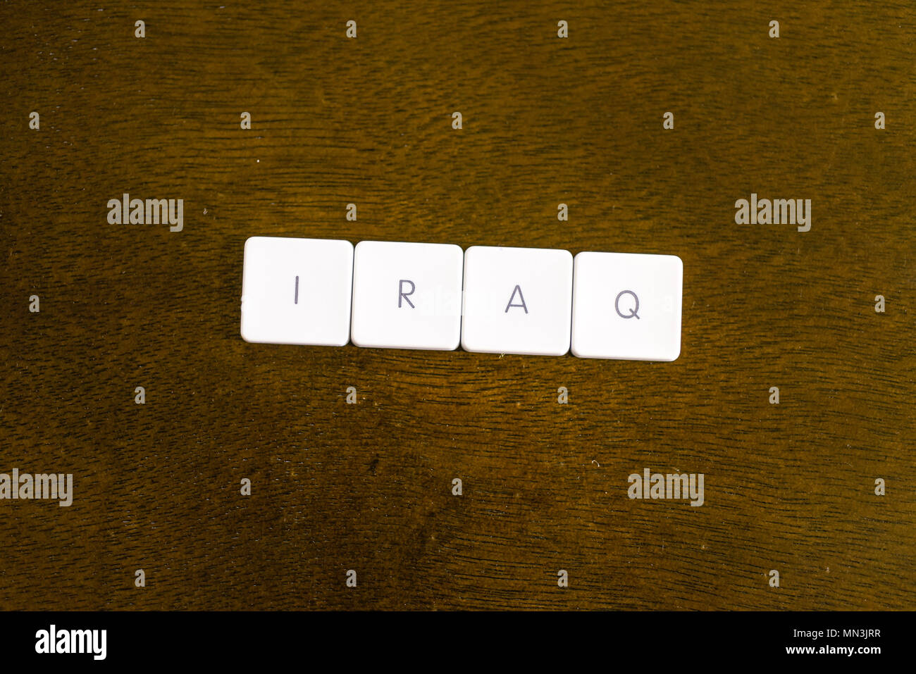 IRAQ word written on plastic keyboard alphabet with dark background ...
