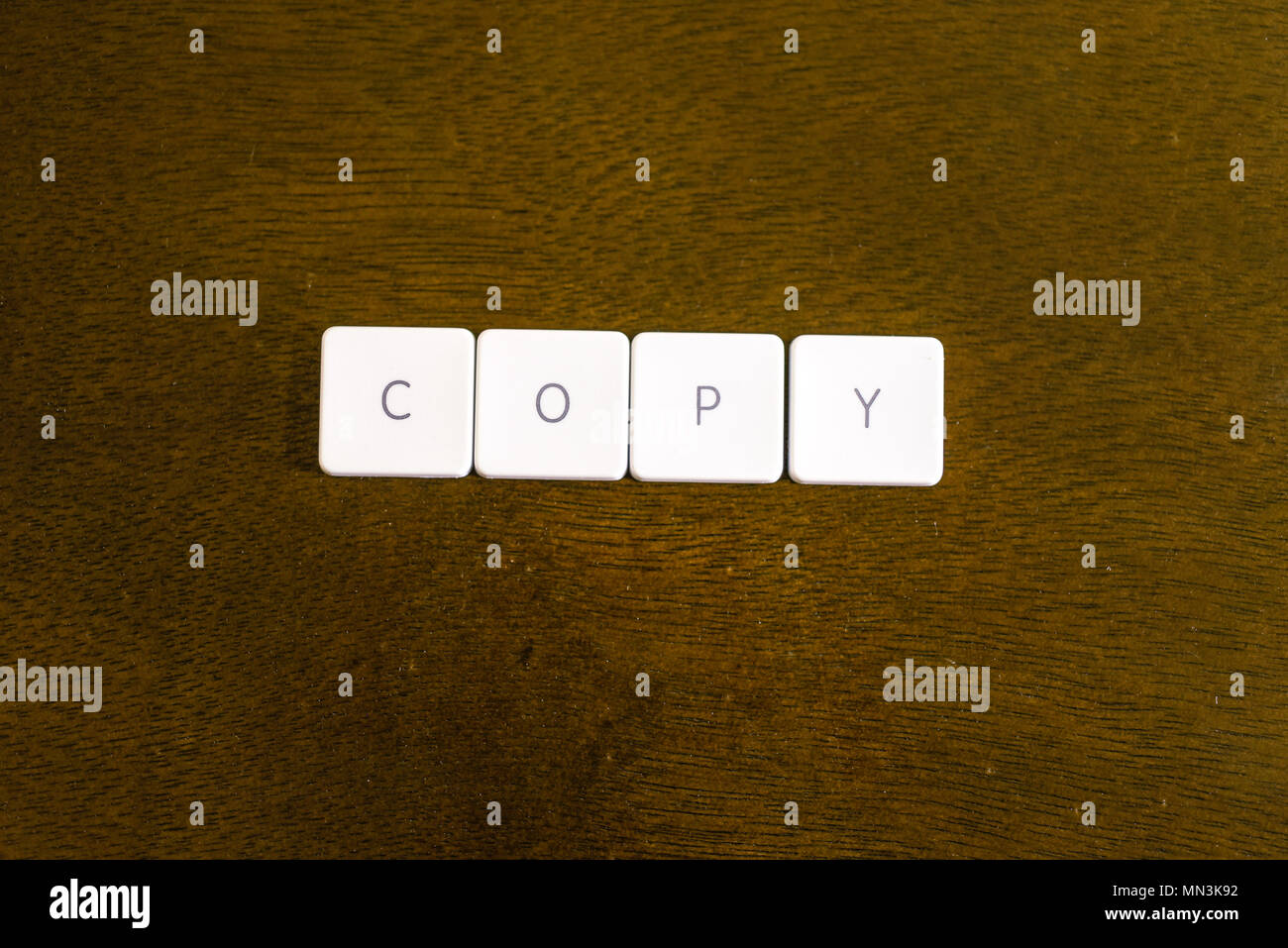 COPY word written on plastic keyboard alphabet with dark background ...