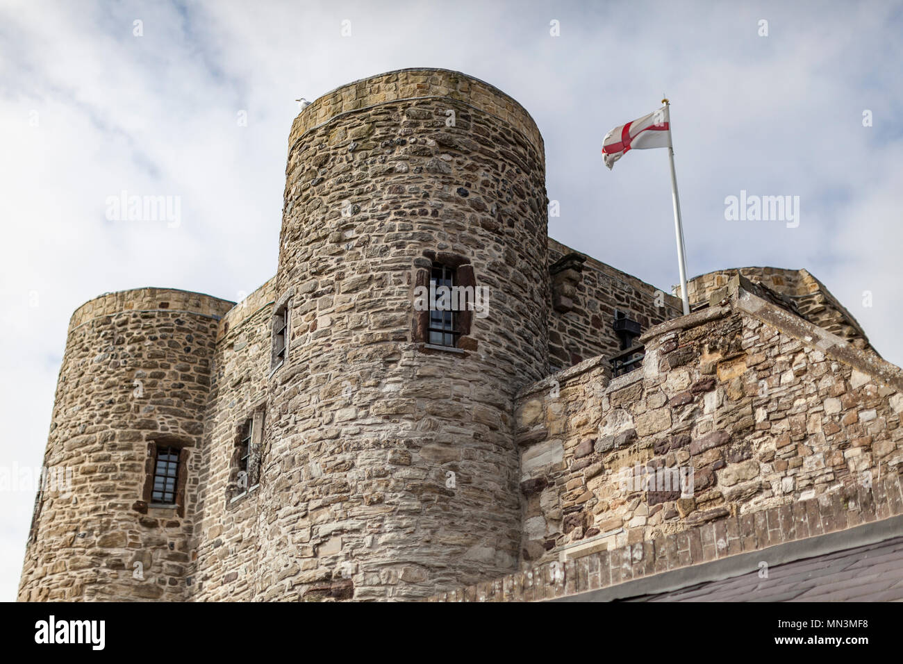 Restored medieval tower with jail cells, a skeleton in a cage and local ...