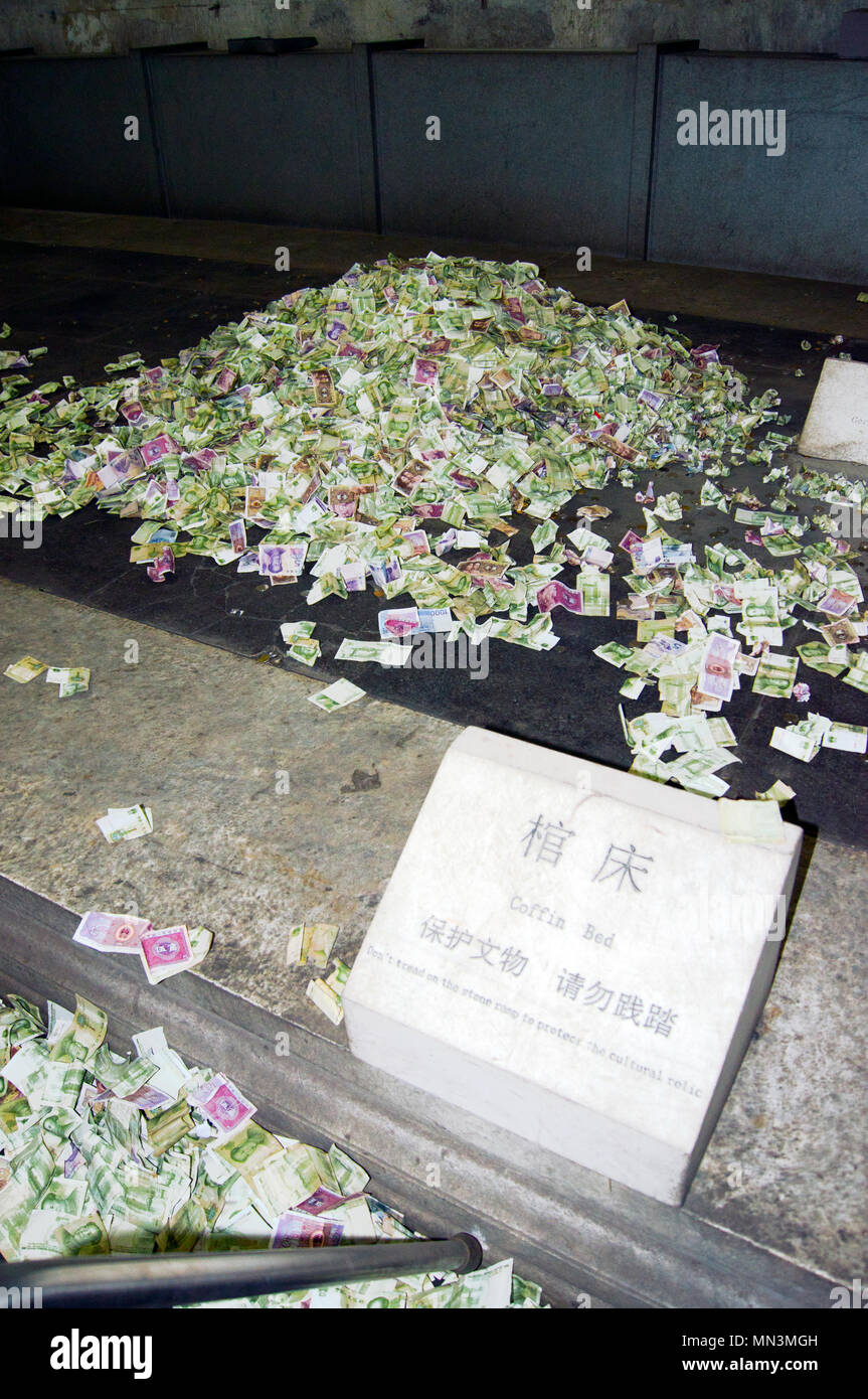A pile of Chinese currency intended as ‘offerings to the gods’, in the ...