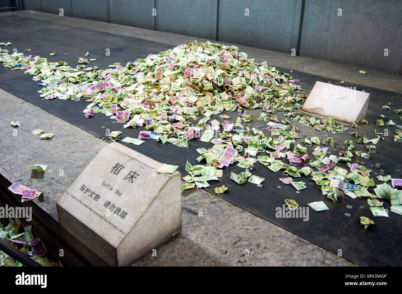 A pile of Chinese currency intended as ‘offerings to the gods’, in the ...
