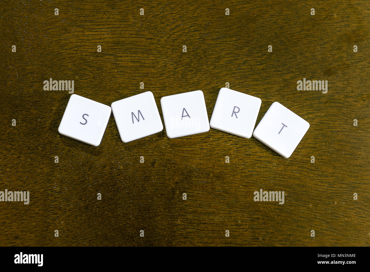 SMART word written on plastic keyboard alphabet with dark background ...