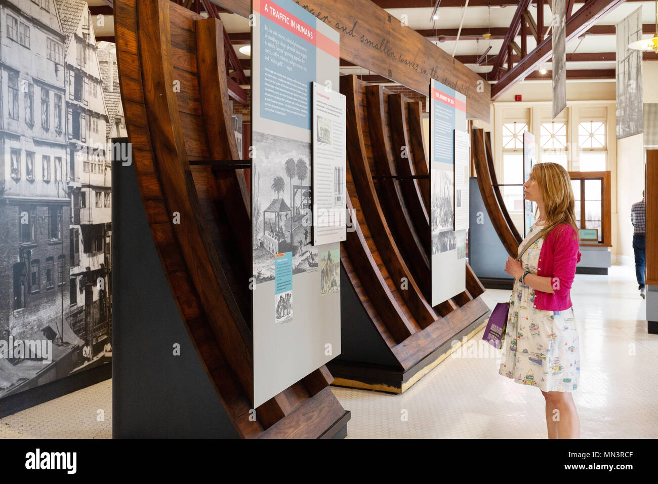 A woman reading an exhibit, Ellis Island Immigration Museum, Ellis ...
