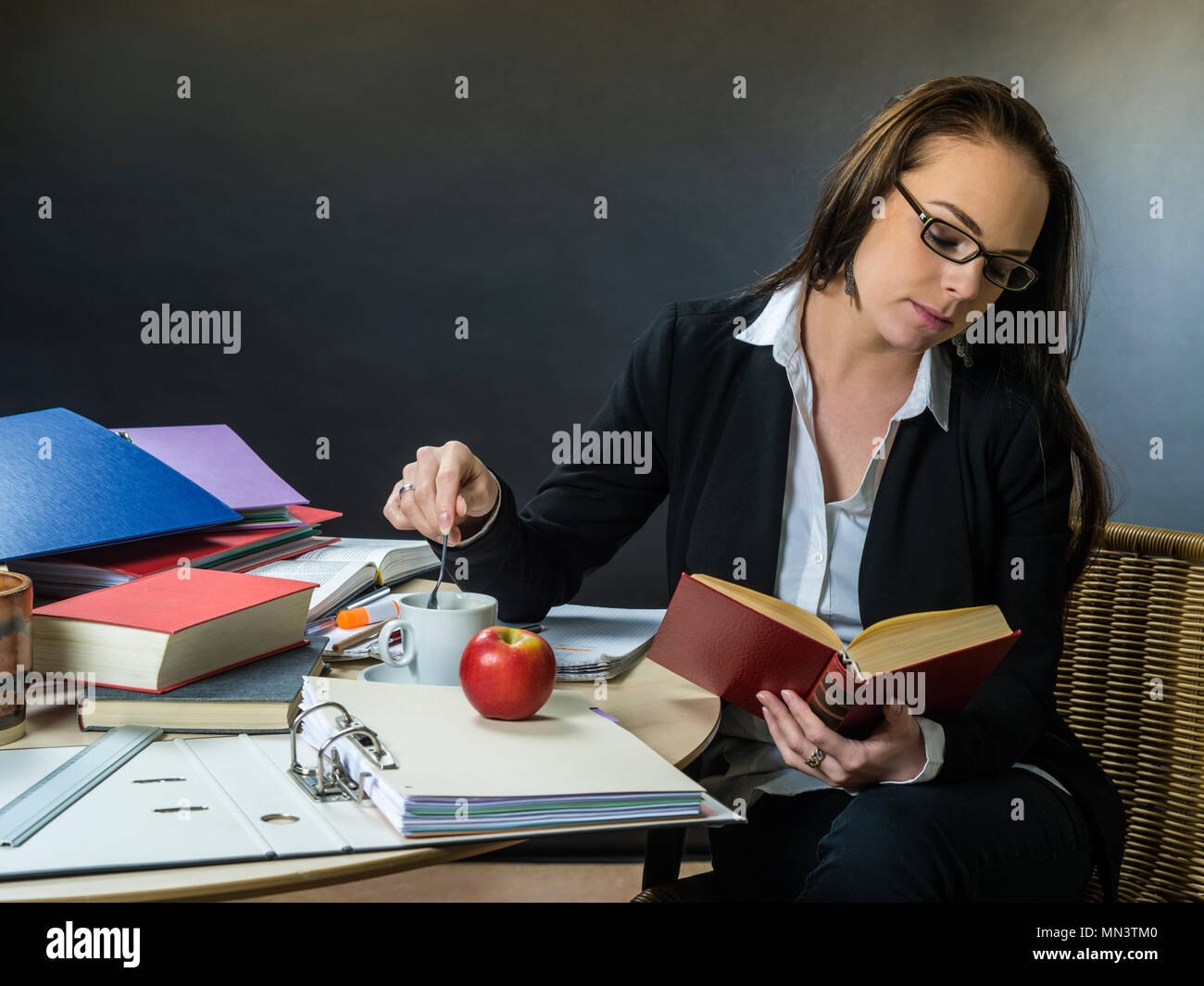 Female reading large book hi-res stock photography and images - Alamy