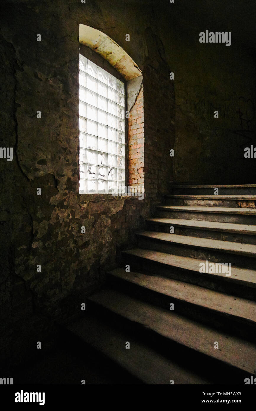 Wooden stairs of a destroyed staircase of an old tenement house in ...