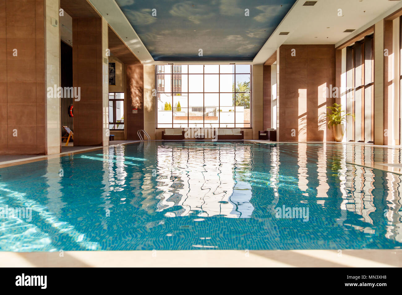 Indoor swimming pool interior Stock Photo - Alamy