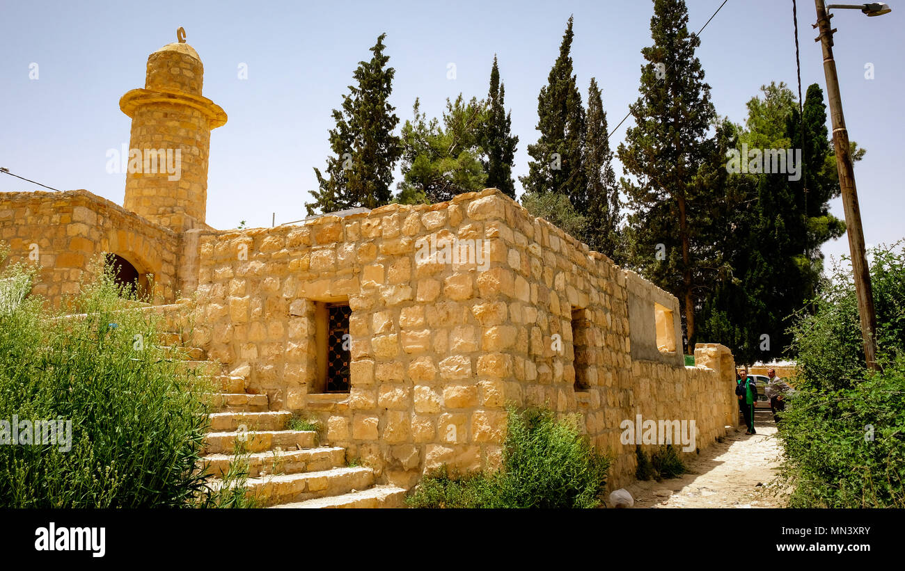 Rock made mosque and its minaret in a jordanian village Stock Photo - Alamy