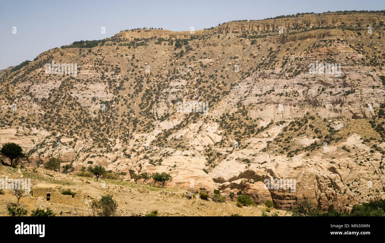 Arid climate landscape with mountains in Wadi Dana valley Stock Photo ...