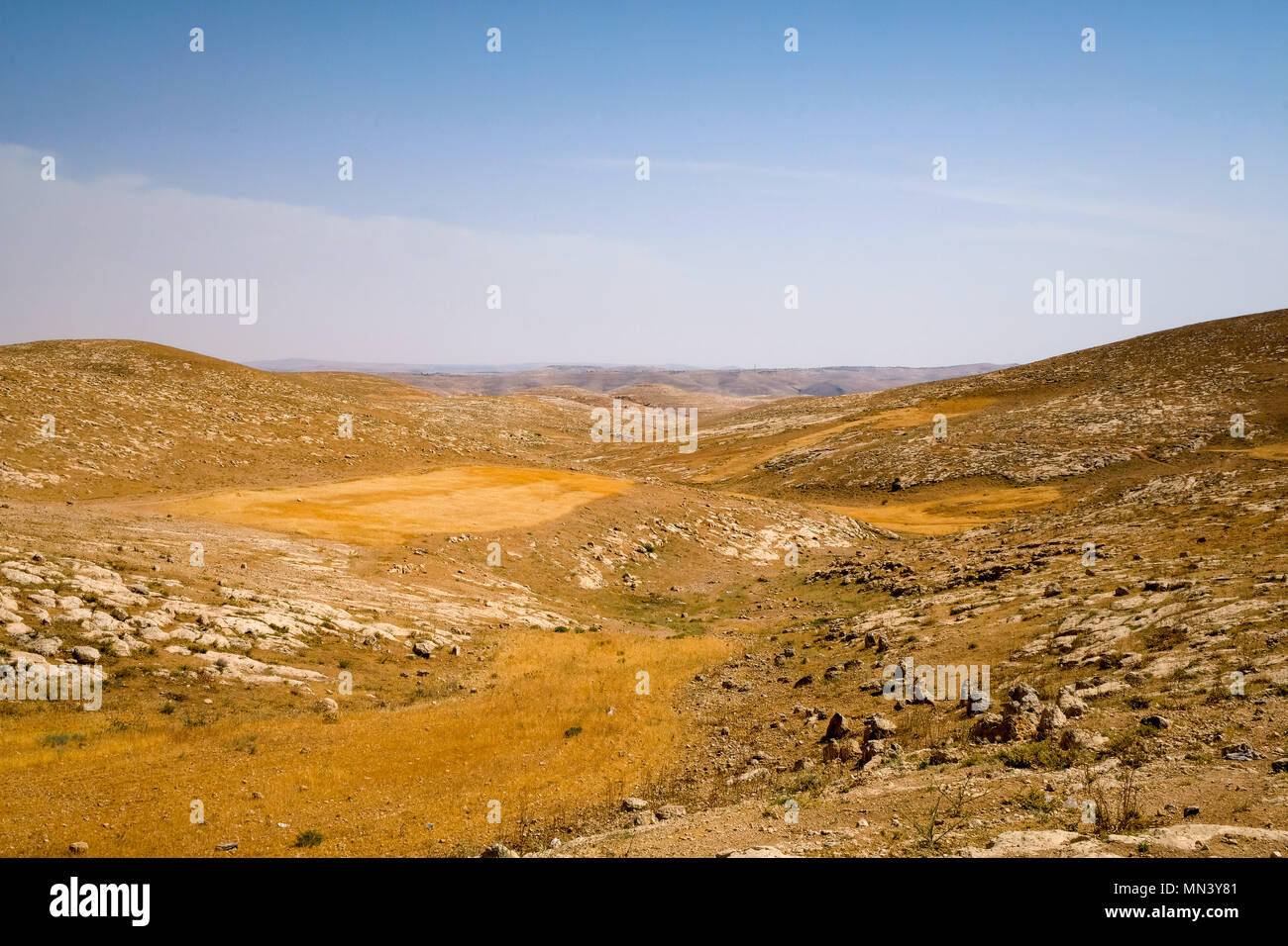 Arid climate landscape with sky Stock Photo - Alamy