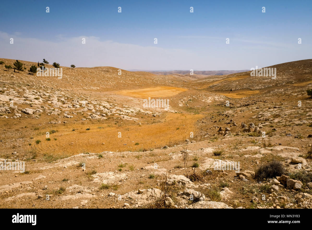 Arid climate landscape with sky Stock Photo - Alamy