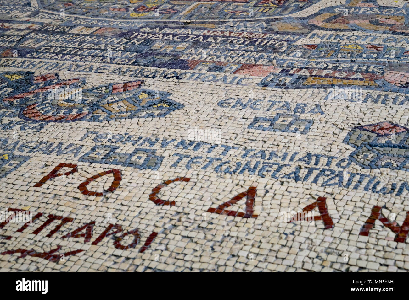 Ancient greek orthodox scriptures on a mosaic pattern in Saint George ...