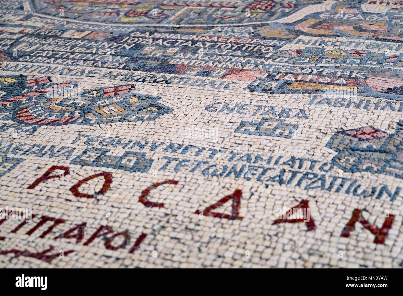 Ancient greek orthodox scriptures on a mosaic pattern in Saint George ...
