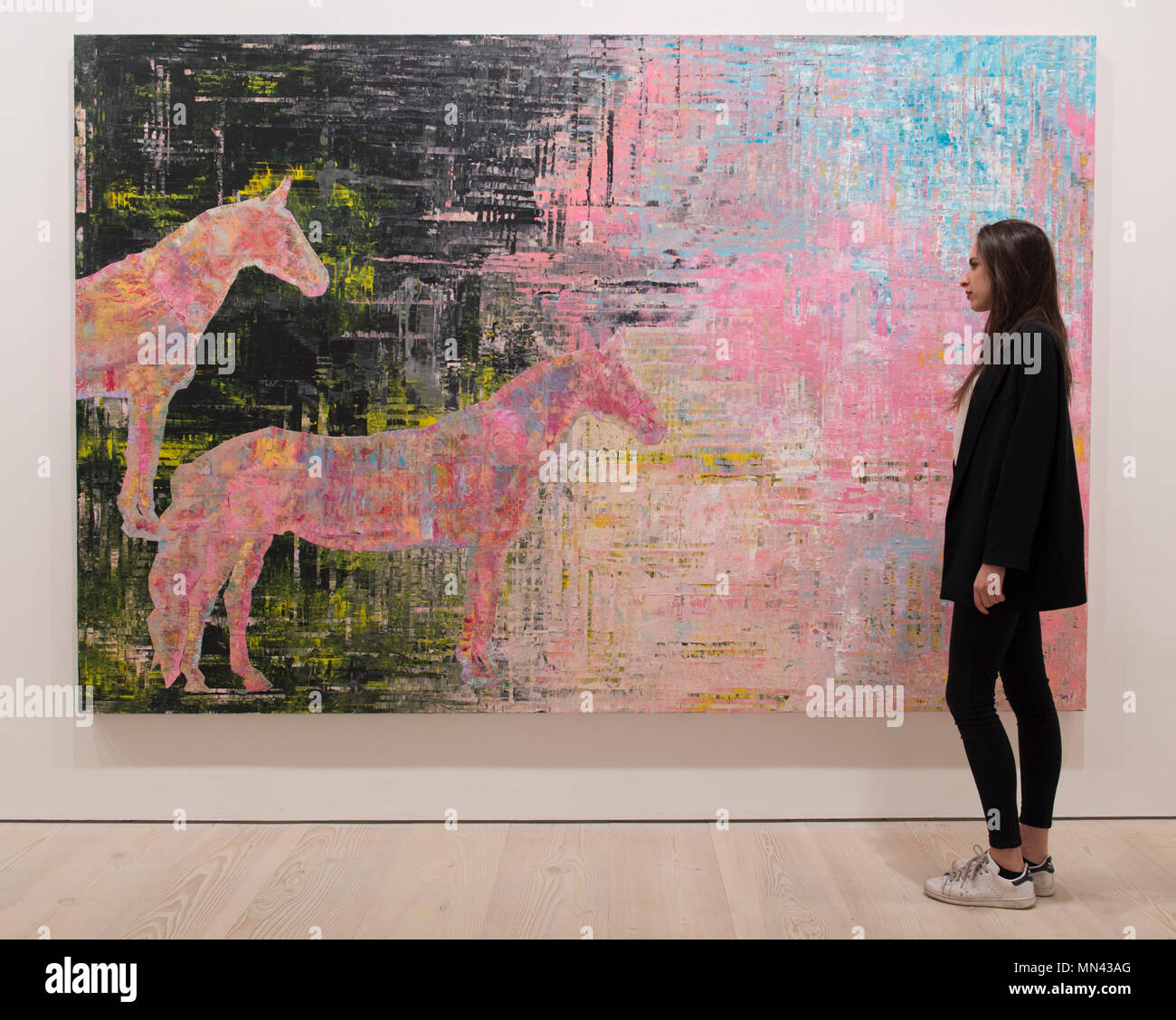 Saatchi Gallery, London, UK. 14 May, 2018. Gallery staff views Oneness ...