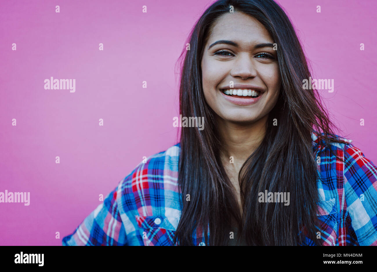 Happy teenager portrait on colored backgrounds Stock Photo - Alamy
