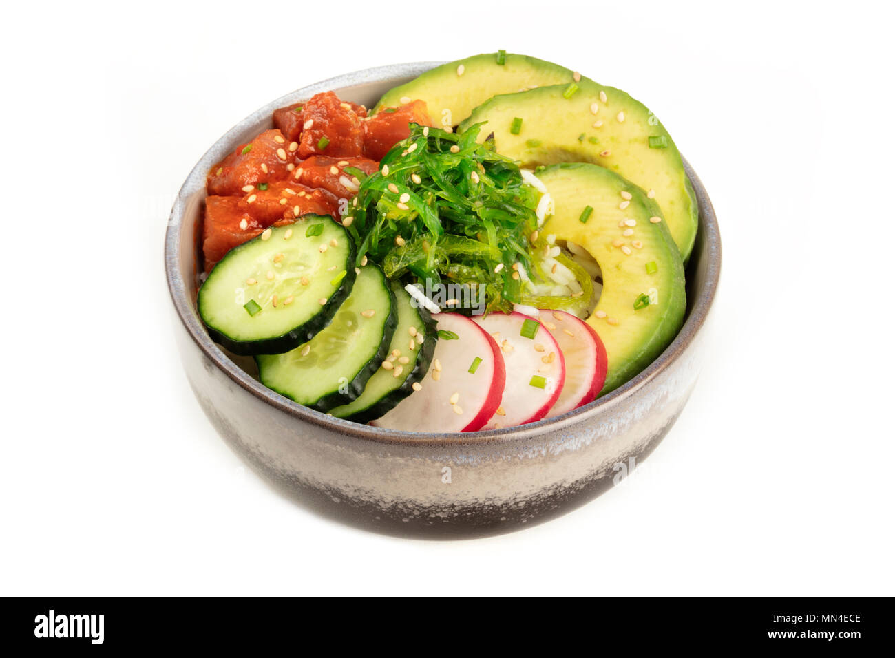 A photo of poke, traditional Hawaiian raw fish salad, on a white ...