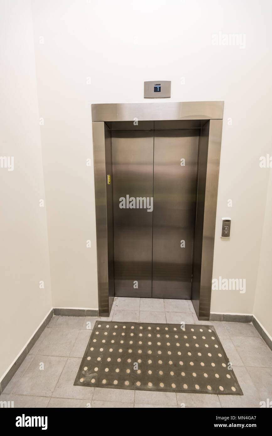 Modern steel elevator hi-res stock photography and images - Alamy