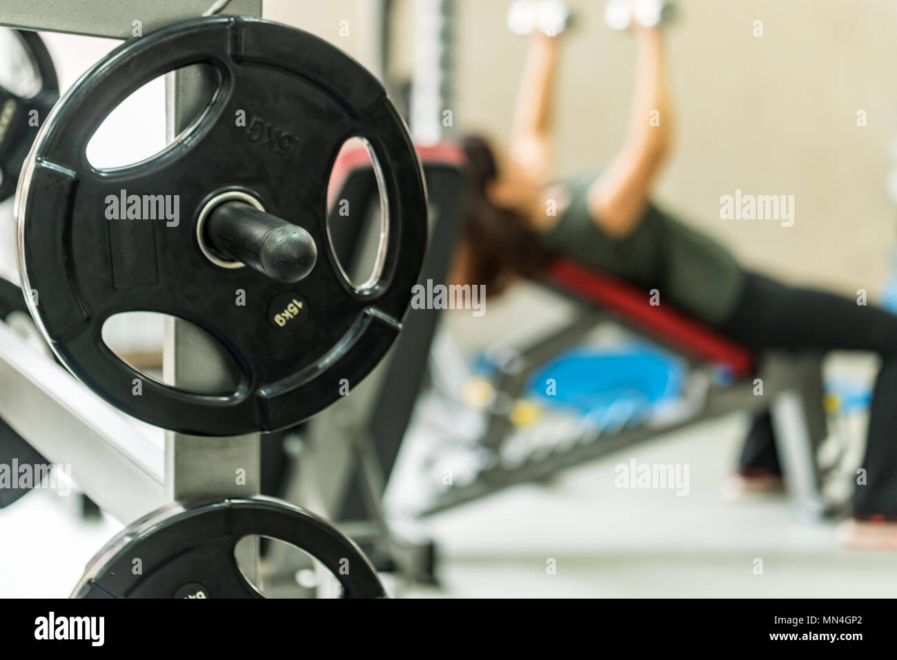 Fitness dumbbell and barbell weight plates Stock Photo - Alamy