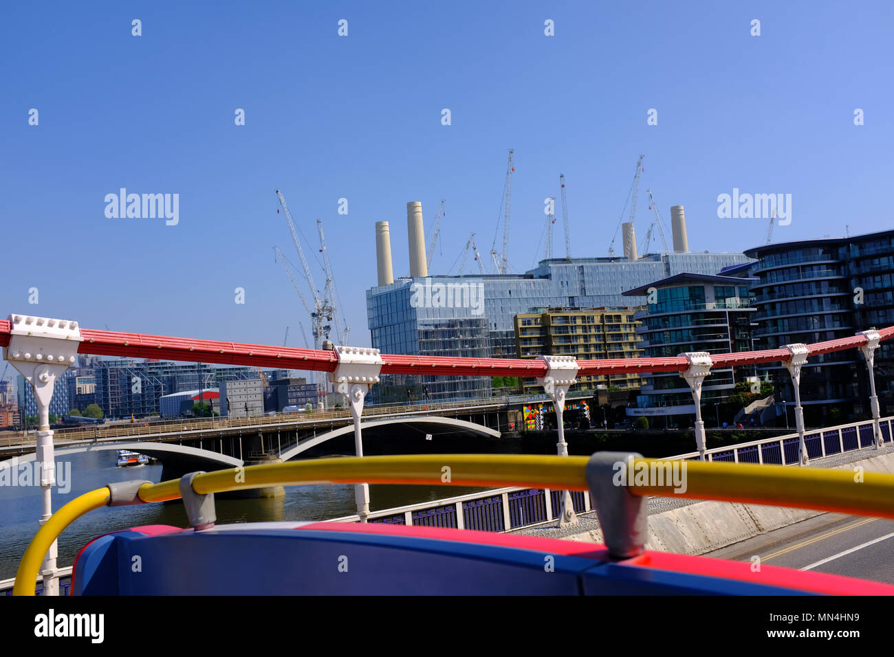 Open top sight seeing bus on Chelsea Bridge, London, UK Stock Photo - Alamy