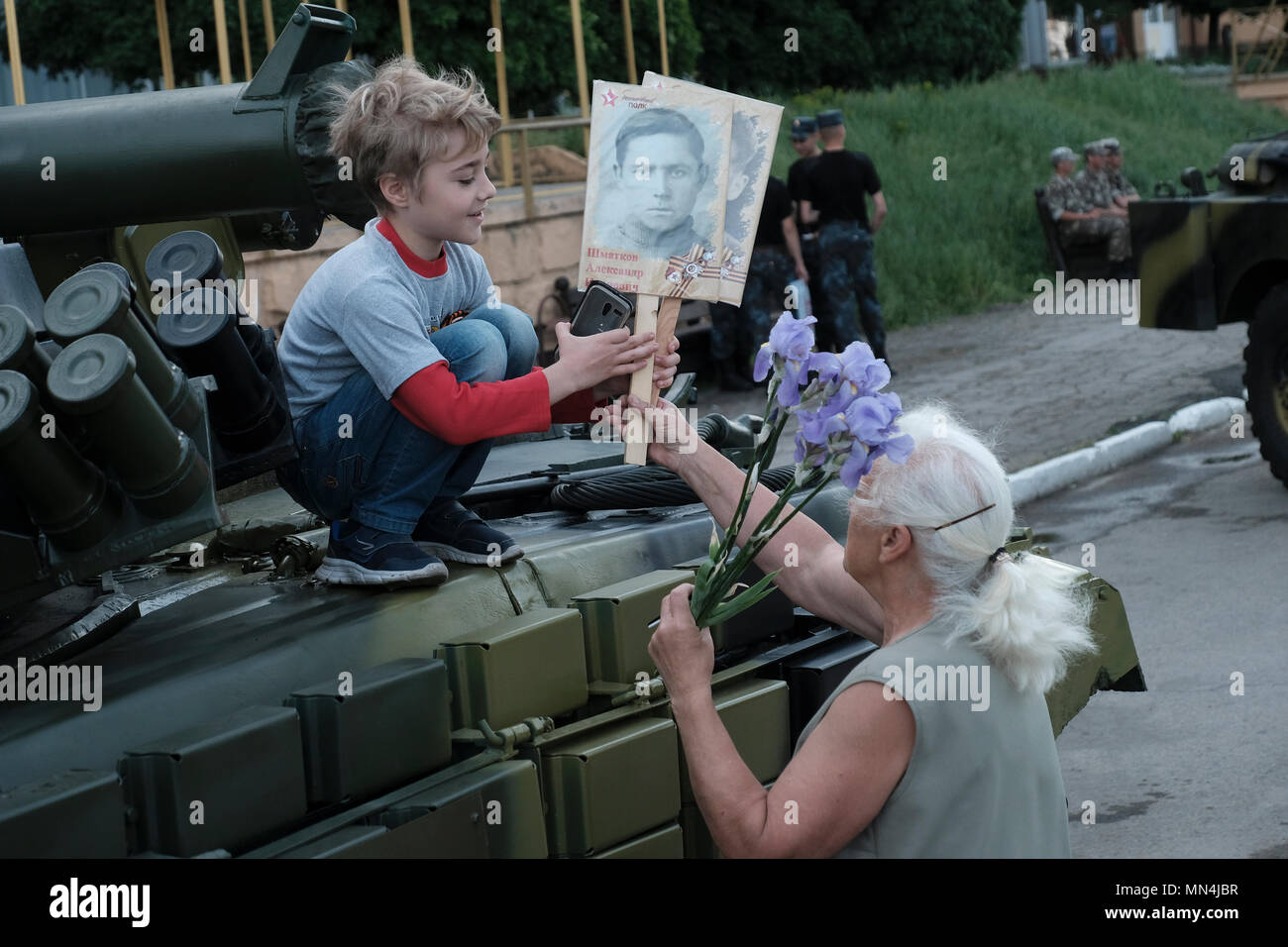 A Transnistrian woman give photos of those who fought in World War II ...