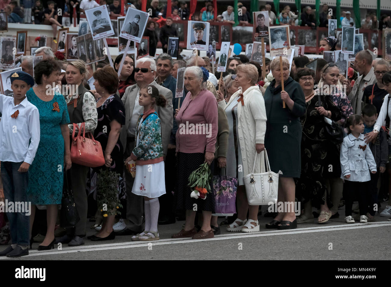 Transnistrian civilians carry portraits of their ancestors and ...