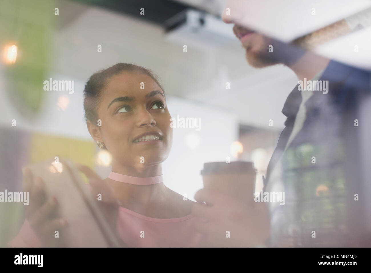 Businessman talking colleague showing information hi-res stock ...
