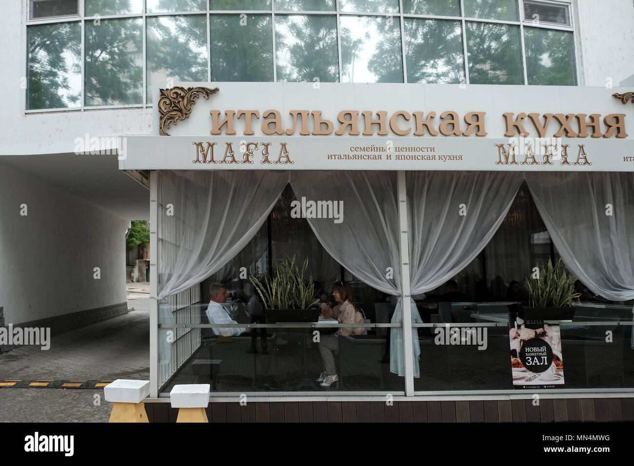 People siting in Mafia restaurant in the center of Tiraspol the capital ...
