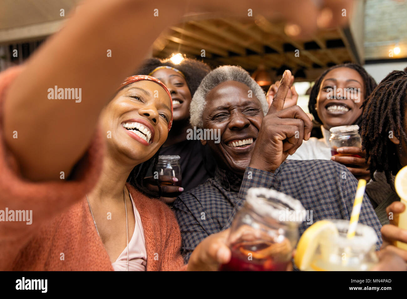 Happy multi-generation family posing for selfie Stock Photo - Alamy