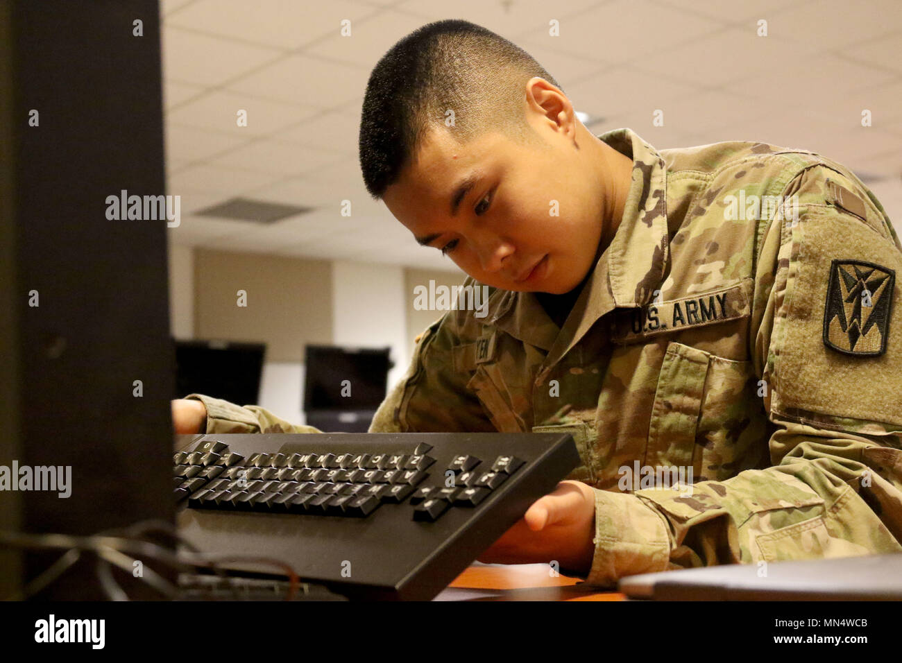 Pfc. Dorold Nguyen, a PATRIOT Fire Control Enhanced Operator/Maintainer ...