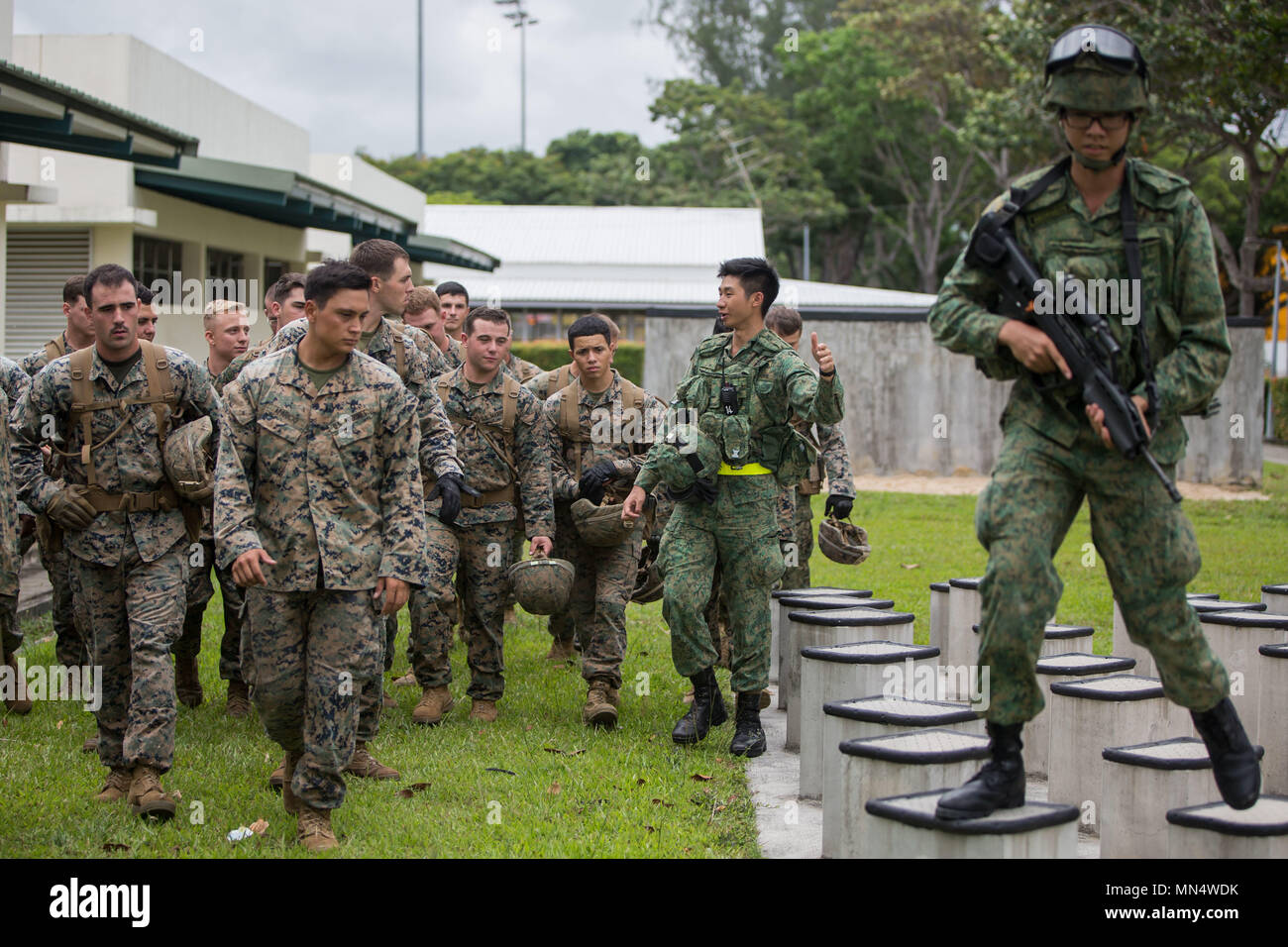 Singapore Armed Forces Soldiers demonstrate how to navigate the ...