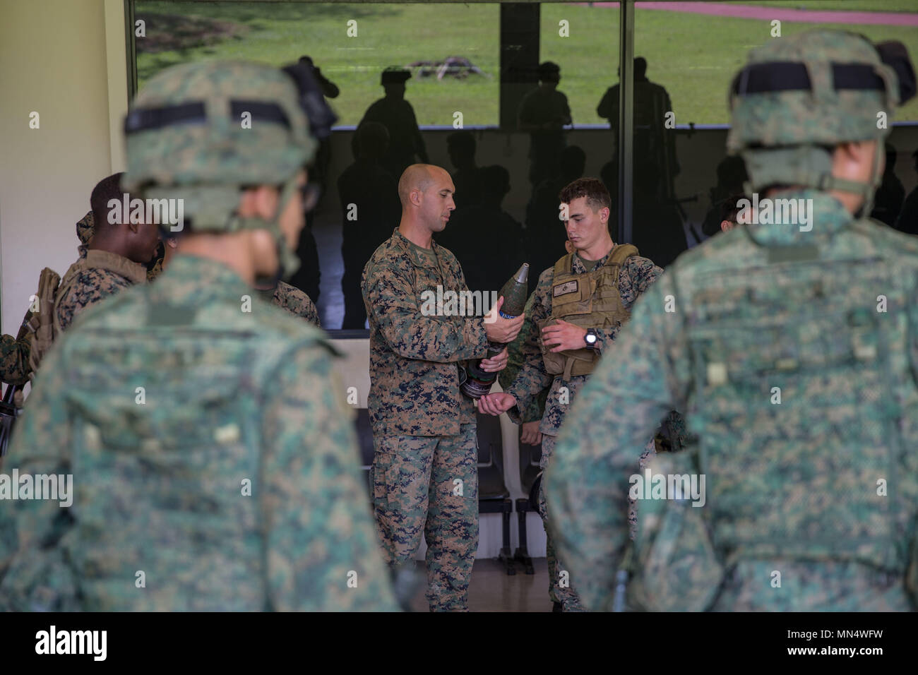 U.S. Marine Corps Capt. Ryan Porch (left) and Lance Cpl. Lane Daniels ...