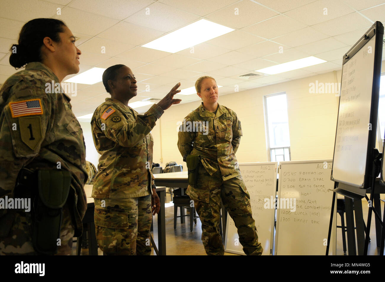 On Aug. 19, U.S. Army Col. Wanda M. Hawley (second from left ...