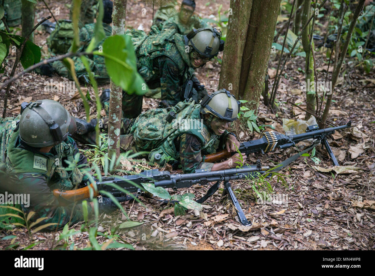 Singapore Armed Forces Soldiers execute a hasty defense for the final ...