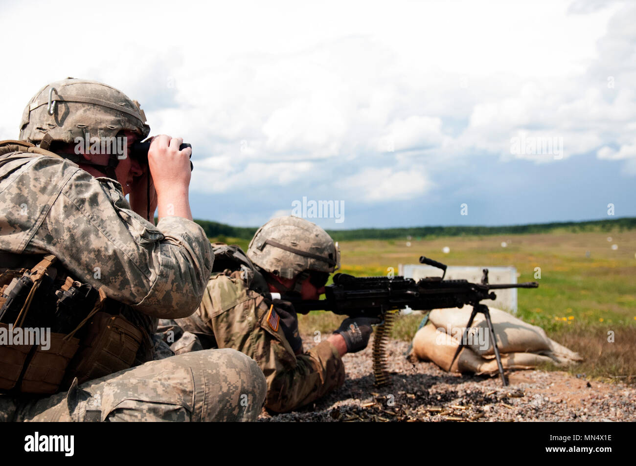 A Soldier fires an M249 machine gun August 5 2017 during annual ...