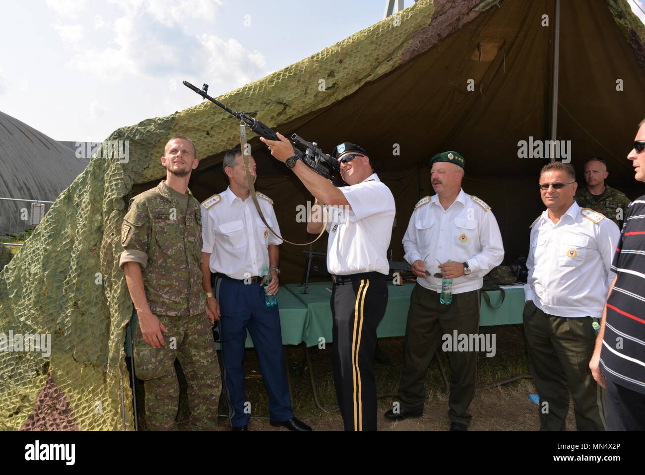 Maj. Gen. Corey Carr checks out a Slovak sniper rifle at the Silac Air ...