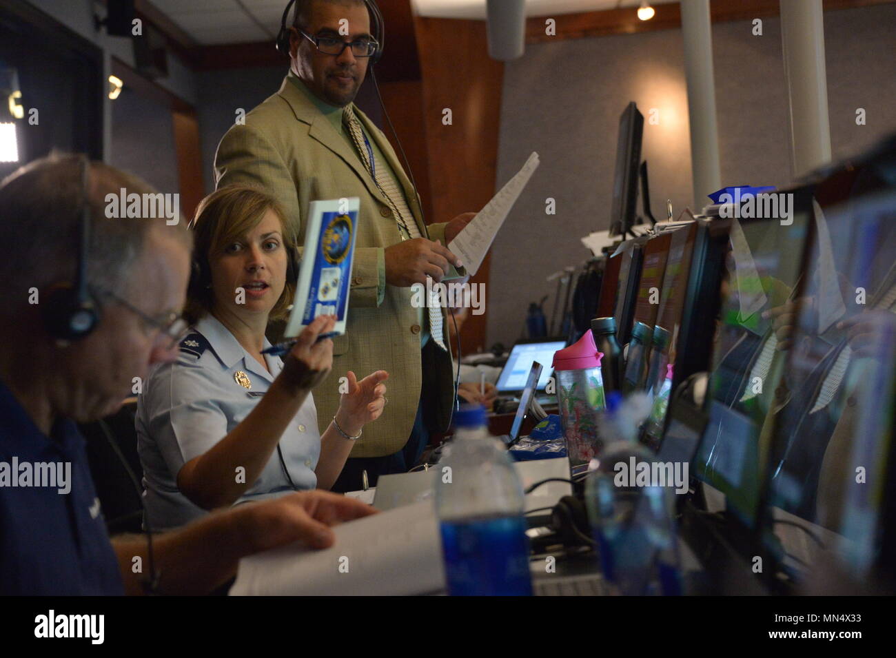 Riaz Musani from The Aerospace Corporation and Lt. Col. Heather Bogstie ...
