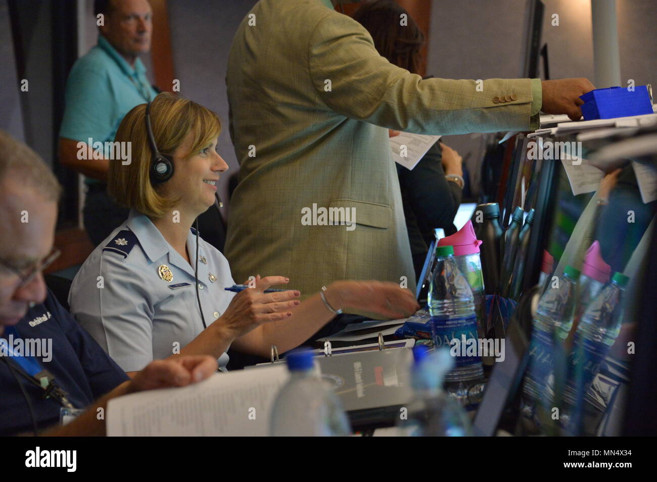 Riaz Musani from The Aerospace Corporation and Lt. Col. Heather Bogstie ...