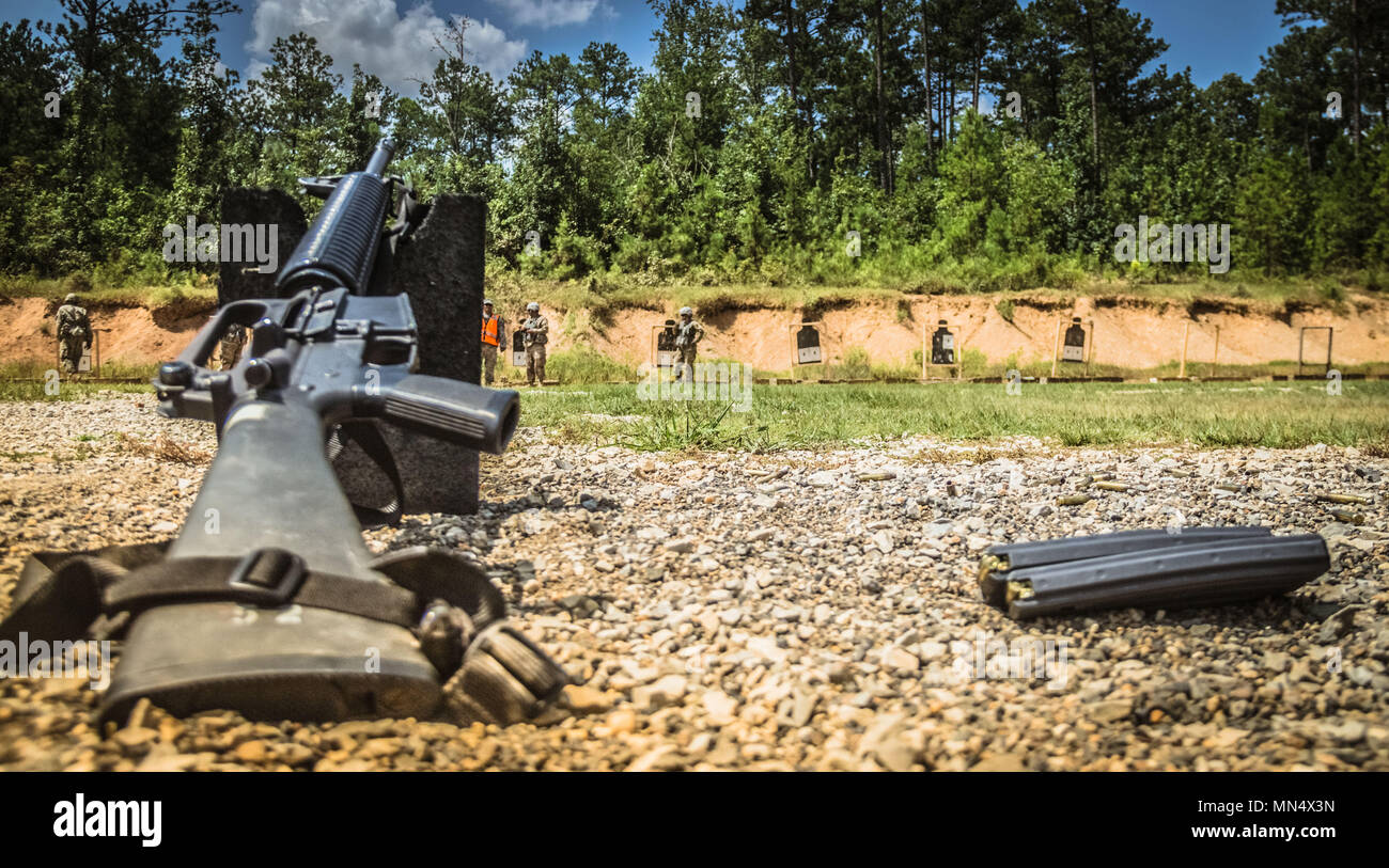 Having laid their arms and ammunition in their respective firing lanes ...