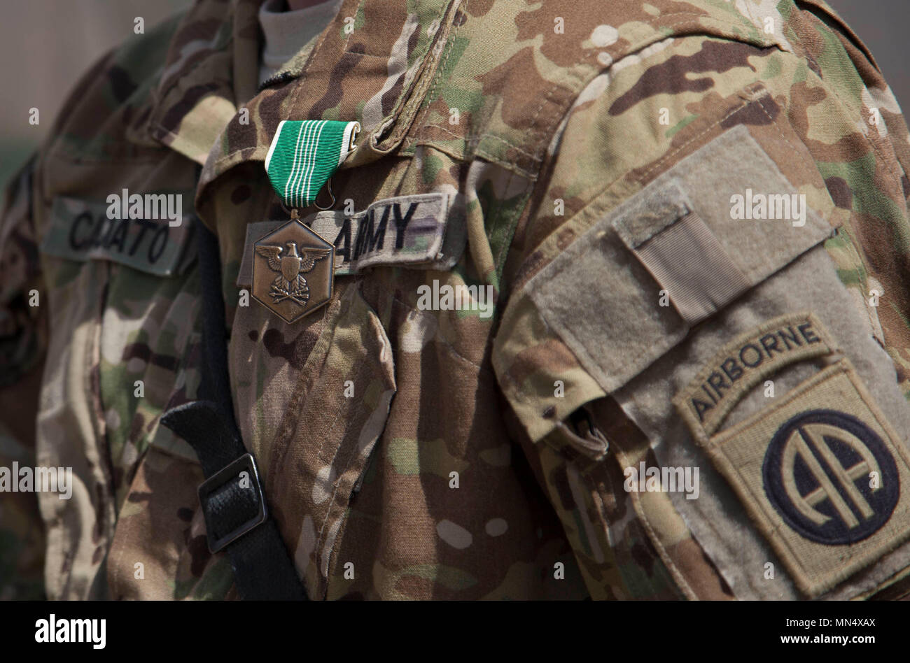 An Army Commendation Medal rests on the uniform of a U.S. Army ...