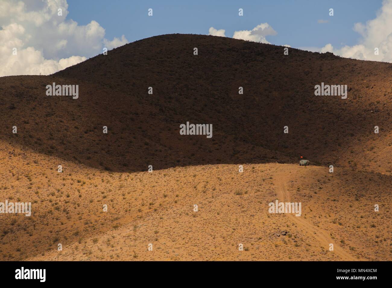 A lone HMMWV overlooks the valley below during Decisive Action Rotation ...