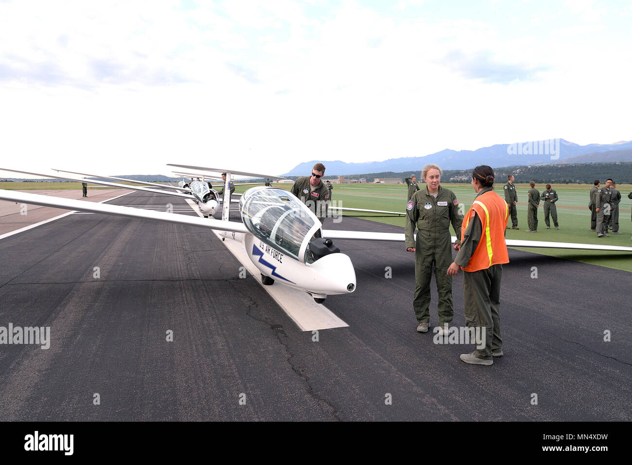 Cadet instructor pilots and students prepare to launch their TG-15A sailplanes on a training ...