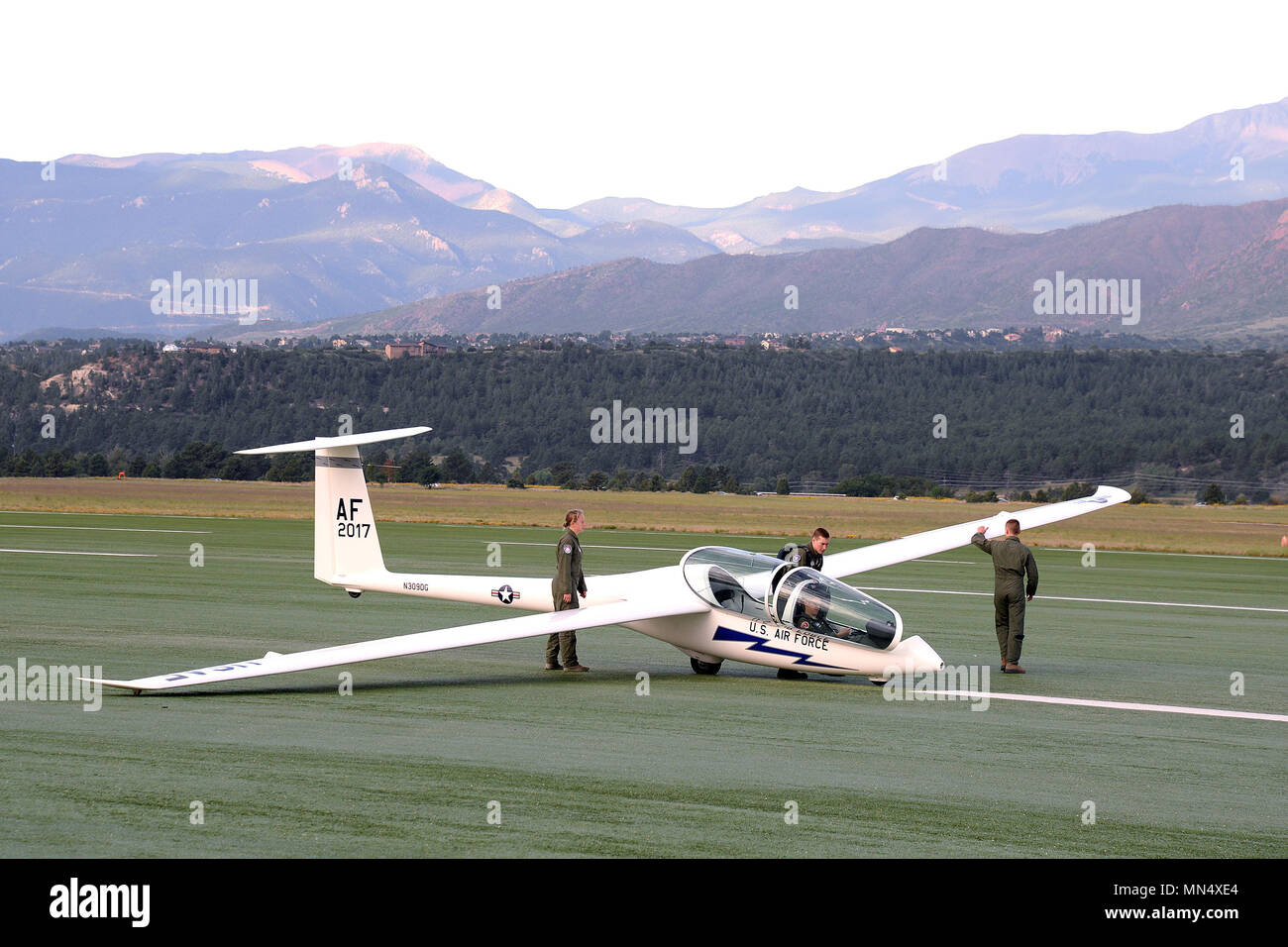 Cadet instructor pilots and students recover a TG-15A sailplanes after ...