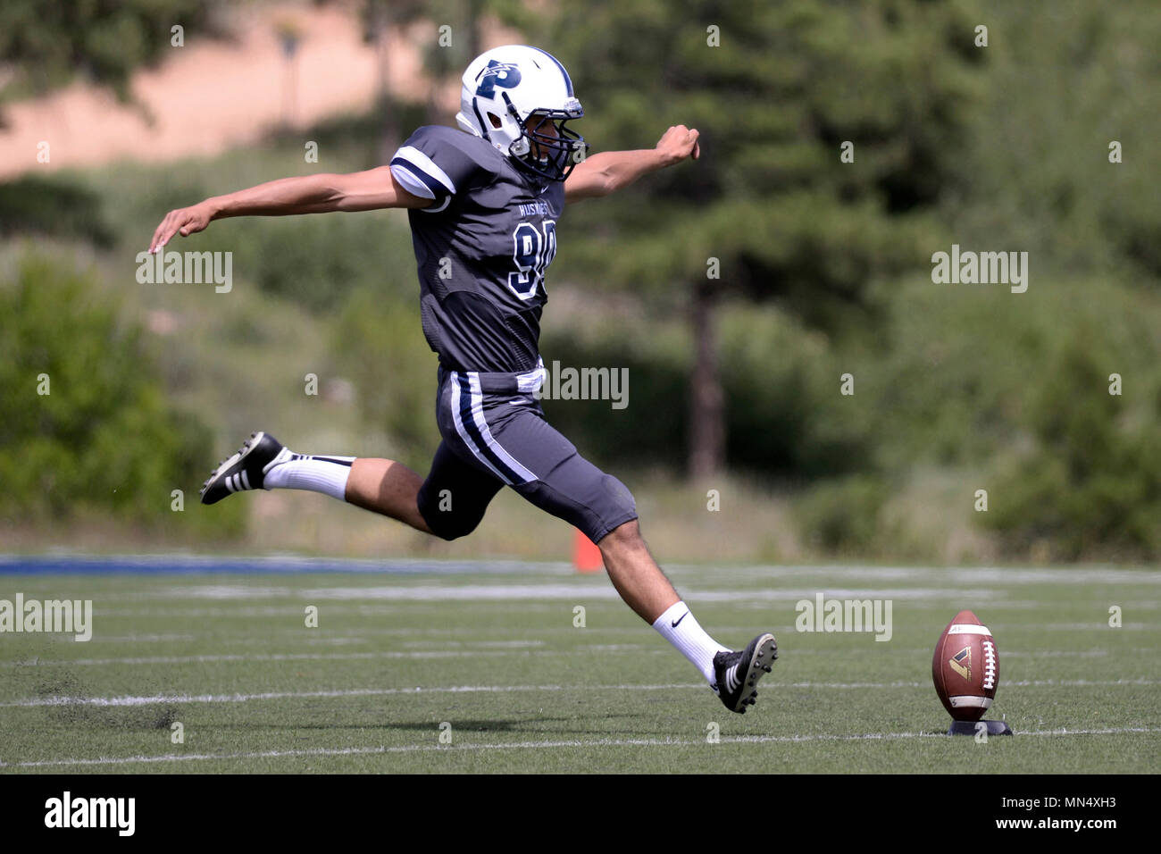 Cadet Candidate Hardy Trafford kicks as the U.S. Air Force Academy ...