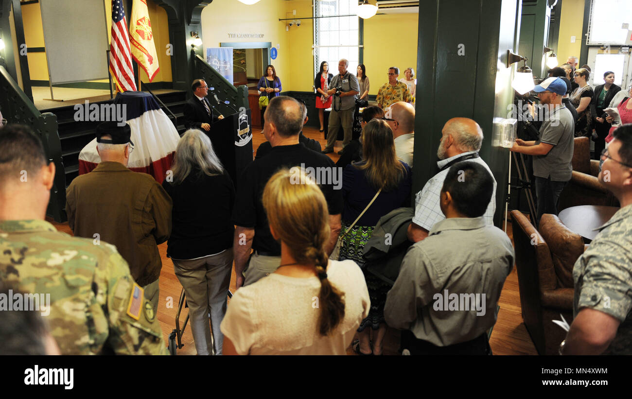 Museum Director Erik Flint addresses a packed house for the Lewis Army ...