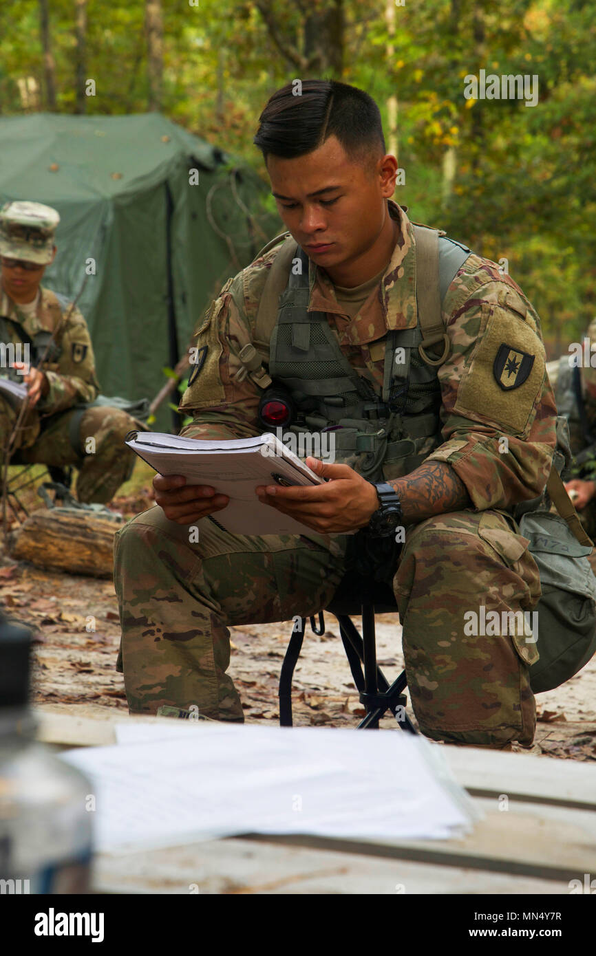 U.S. Army soldier studies the objective during an event in the Expert ...