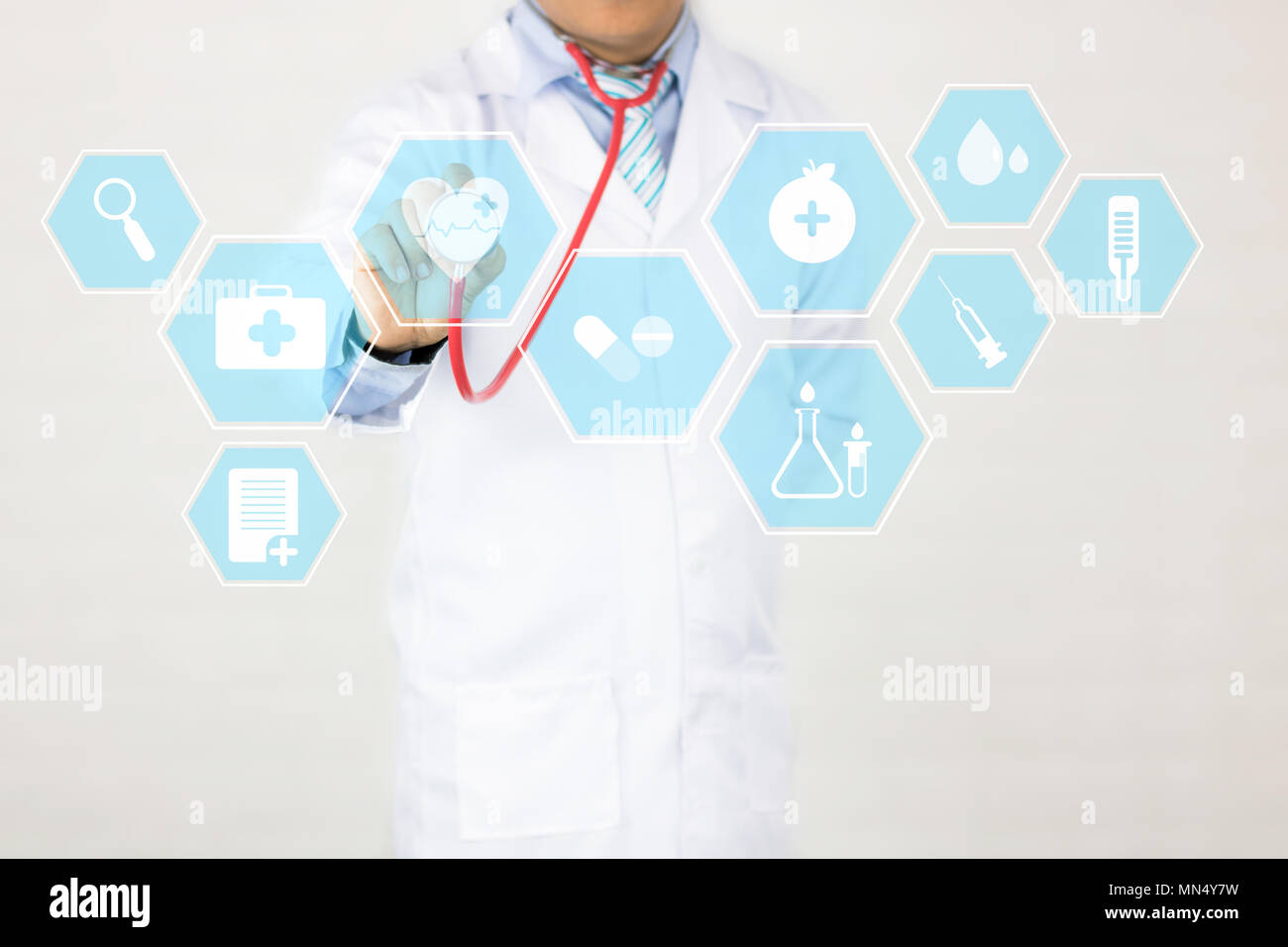 Healthy and illness concept, doctor holding stechoscope on gray and ...